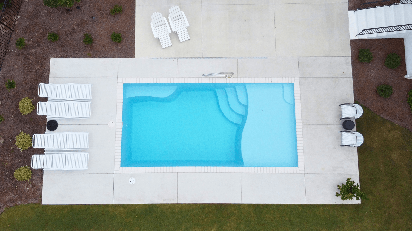Elite Pools, Spas & Hardscapes | Custom Swimming Pool Construction